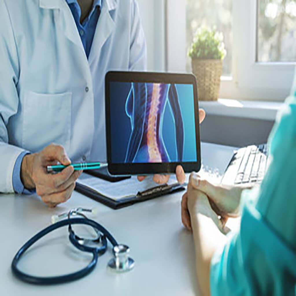Doctor Laptop Spine | Bay State Pain Associates