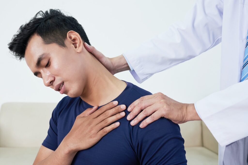 Patient Sufering From Neck Pain | Bay State Pain Associates